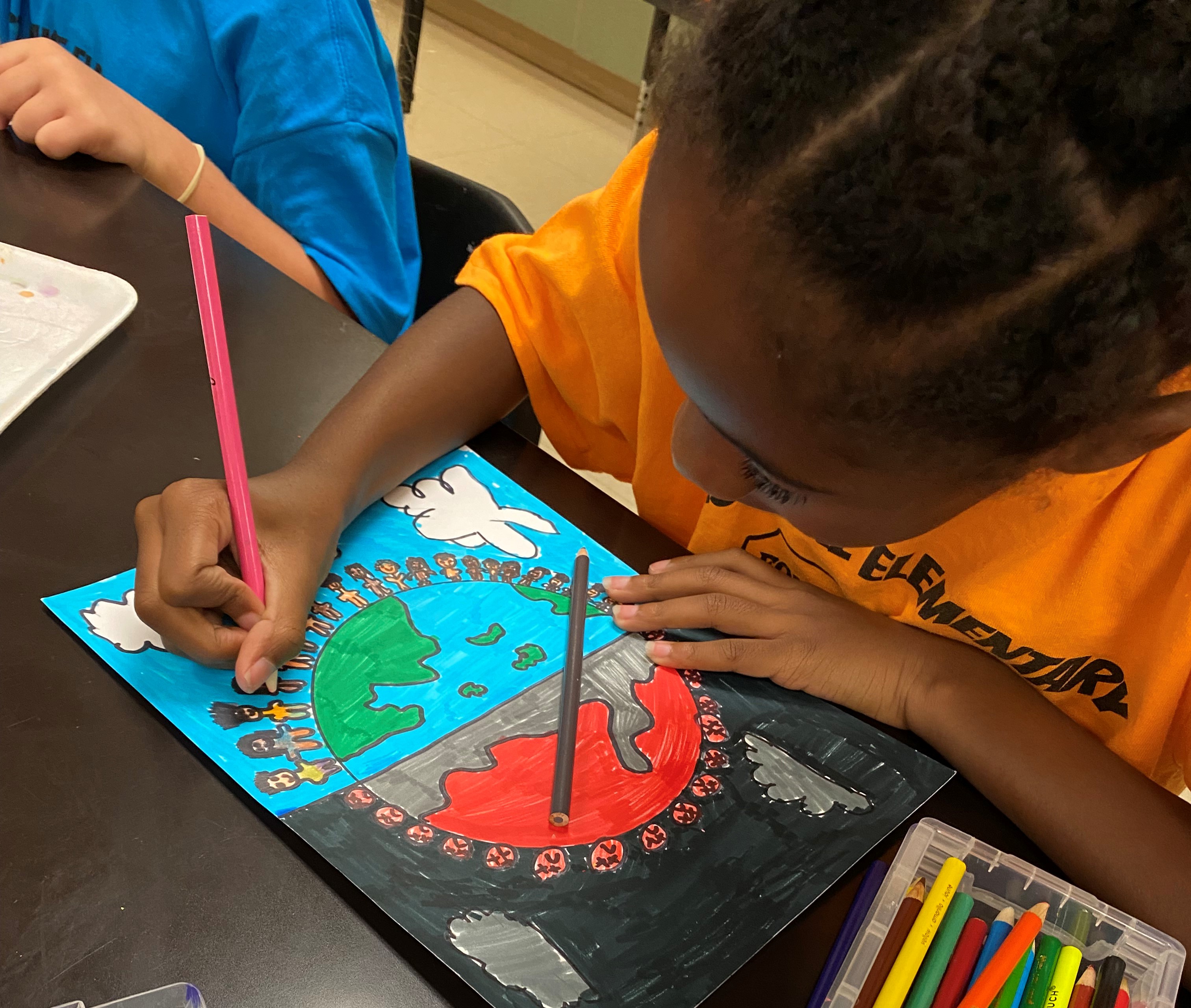 STUDENTS WORK ON CALENDAR CONTEST DRAWINGS - OUConnect