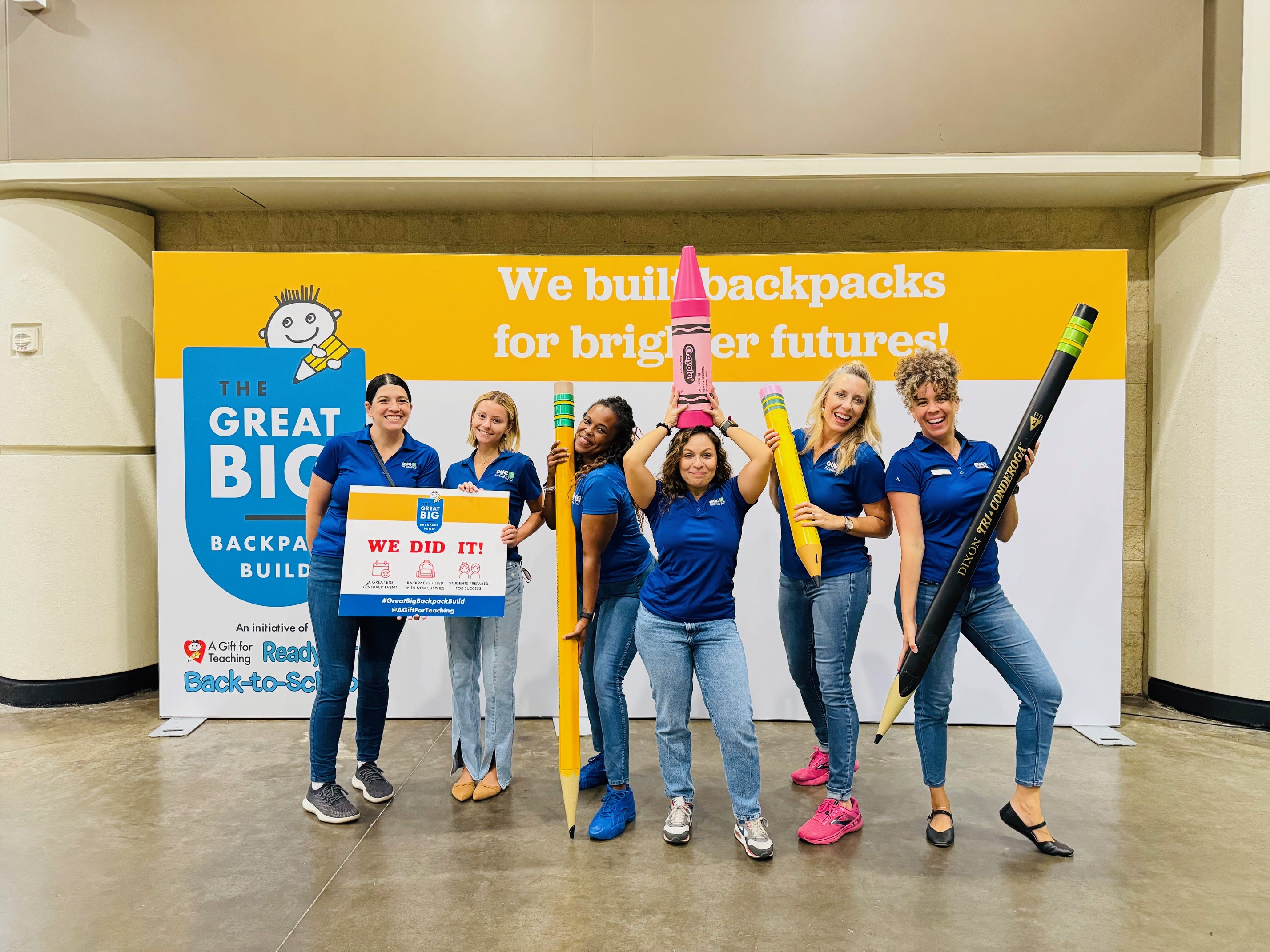 OUC Volunteers Shine at The Great Big Backpack Build® - OUConnect